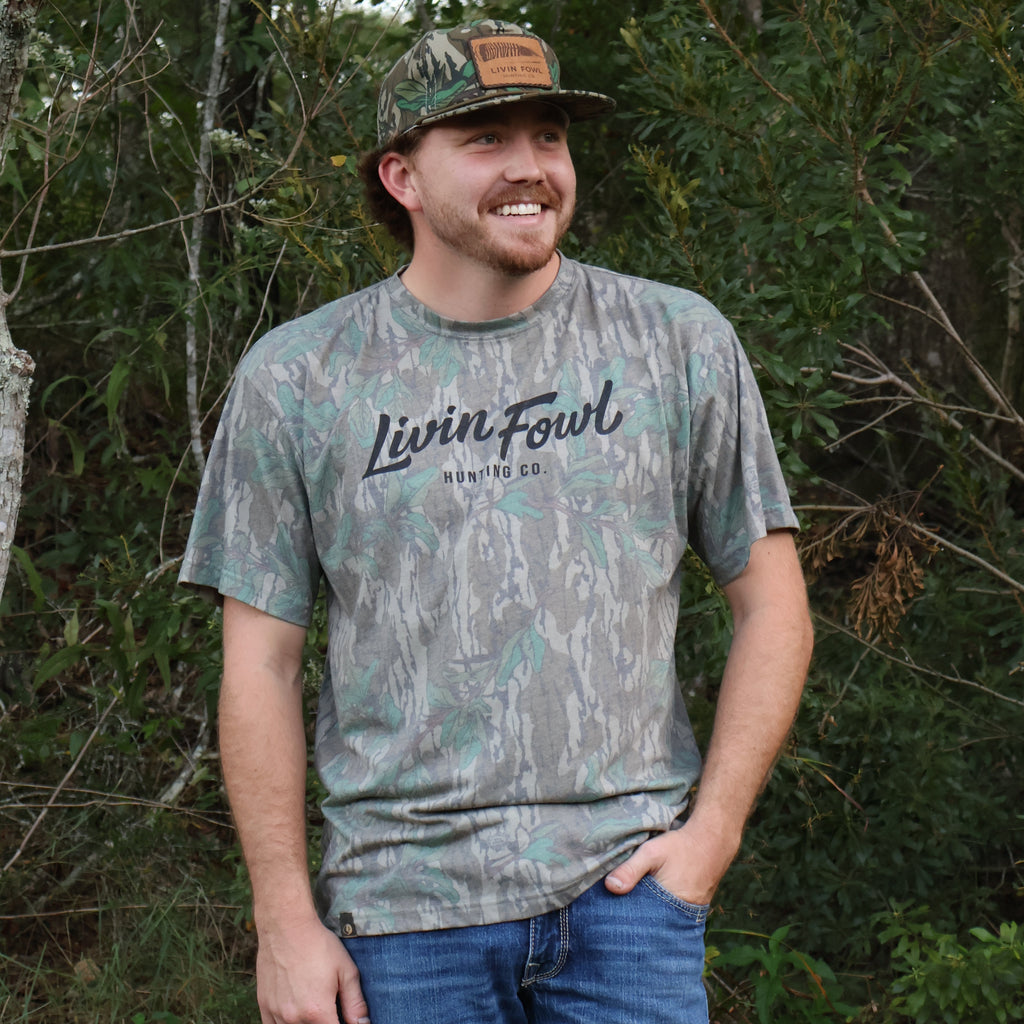LF Script Logo - SS Faded Mossy Oak Green Leaf – Livin Fowl
